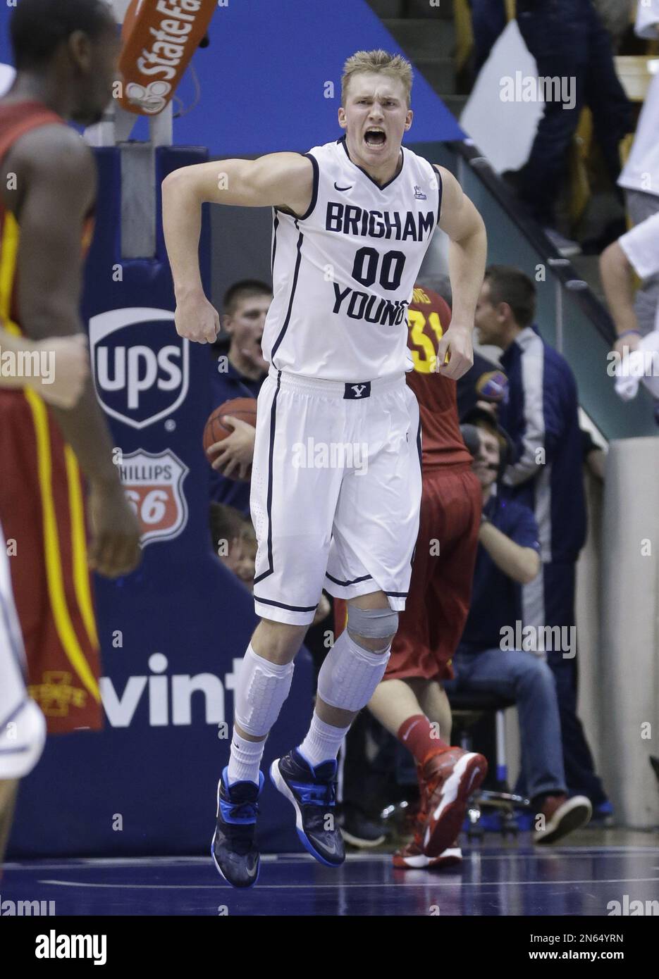 Brigham Young's Eric Mika (00) shouts after scoring against Iowa State ...