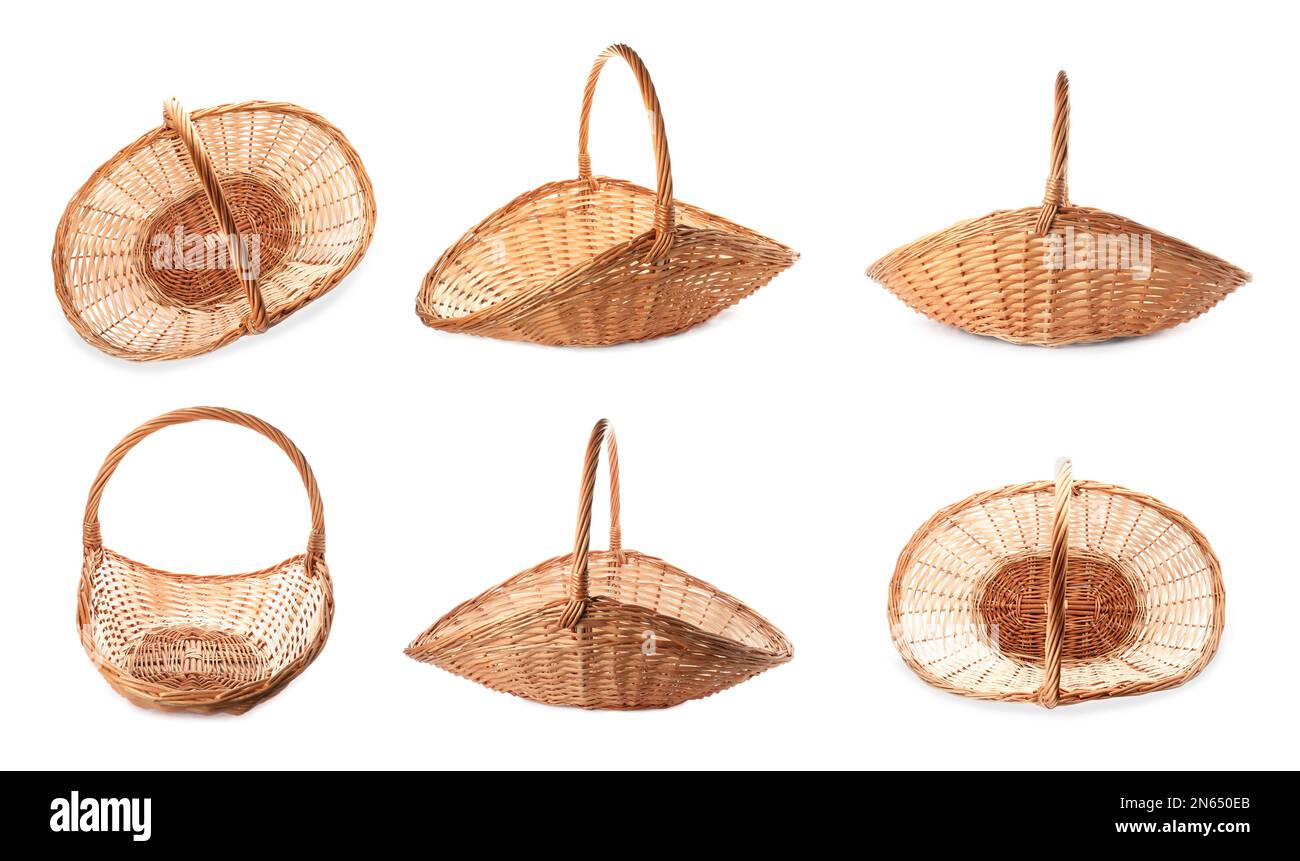 Set with empty wicker baskets on white background Stock Photo - Alamy