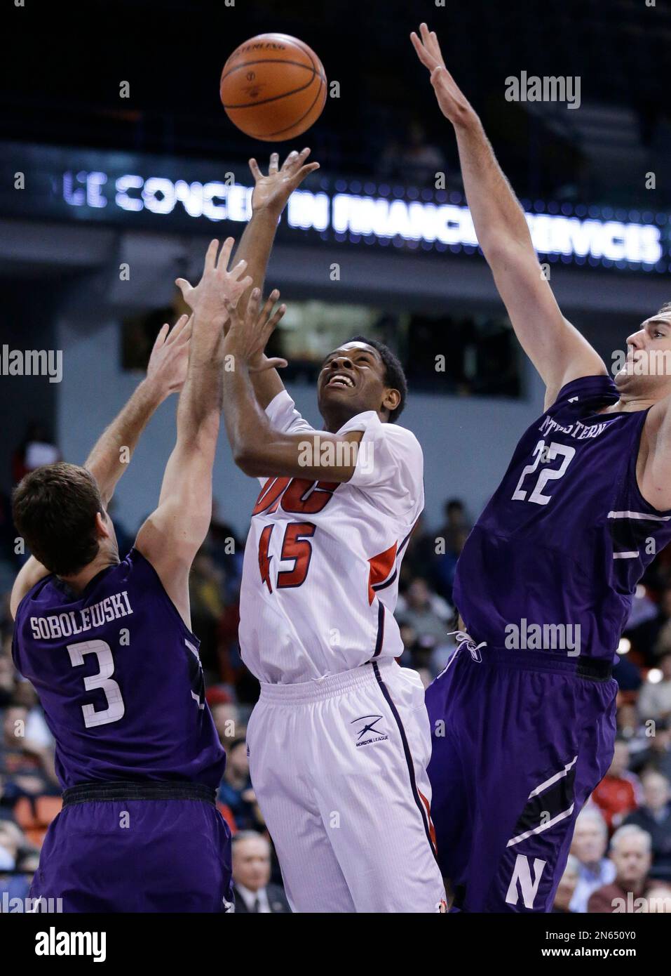Illinois-Chicago guard Kelsey Barlow, center, shoots between ...