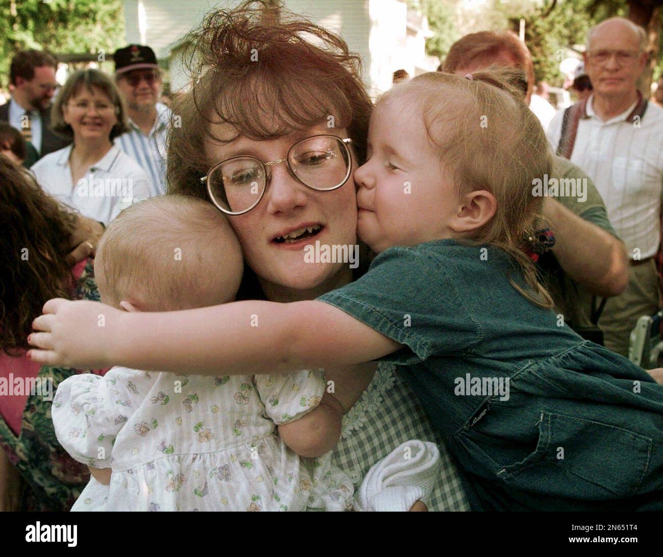 File - In this May 20, 1998 file photo Bobbi McCaughey gets a kiss from ...