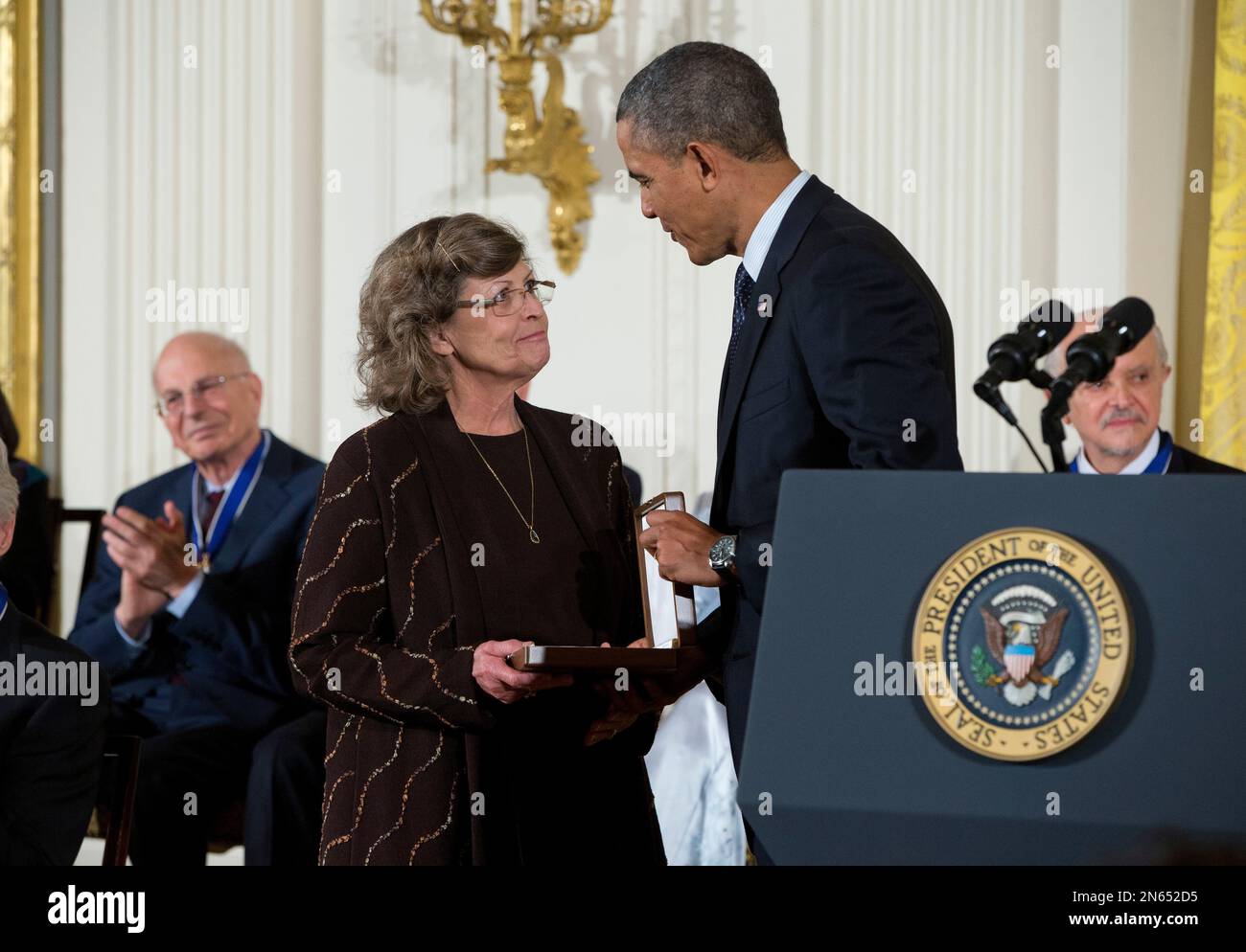 Linnea Smith, accepts the Presidential Medal of Freedom on behalf of ...