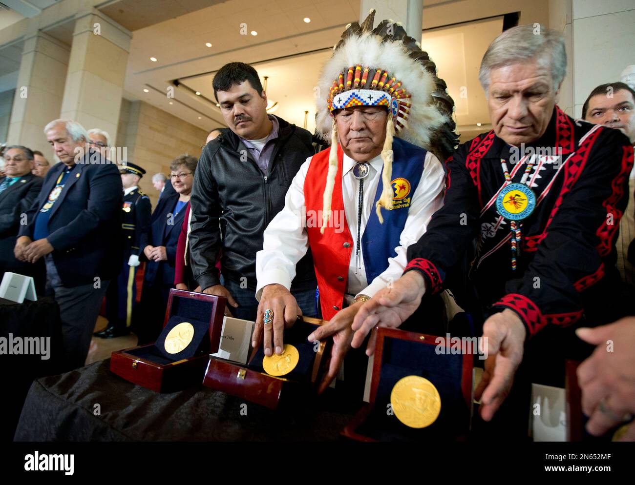 Wallace Coffey, chief of the Comanche Nation of Oklahoma, second from ...
