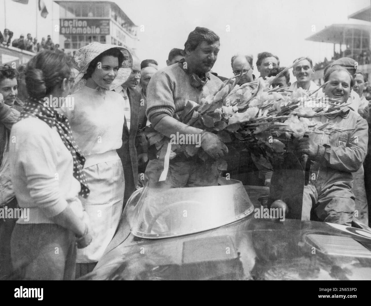 British drivers Duncan Hamilton, left, and Ivor Bueb celebrate after ...