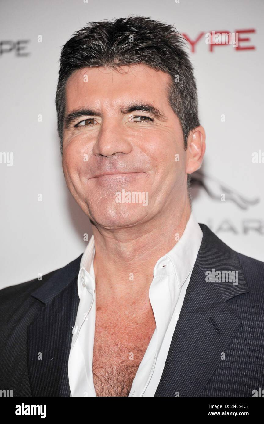 Simon Cowell arrives at the Jaguar reveals the F-Type Coupe, on Tuesday ...