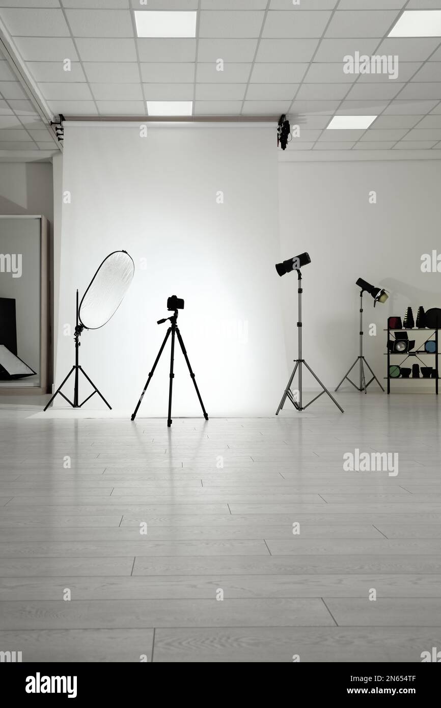 Photo studio interior with set of professional equipment Stock Photo ...