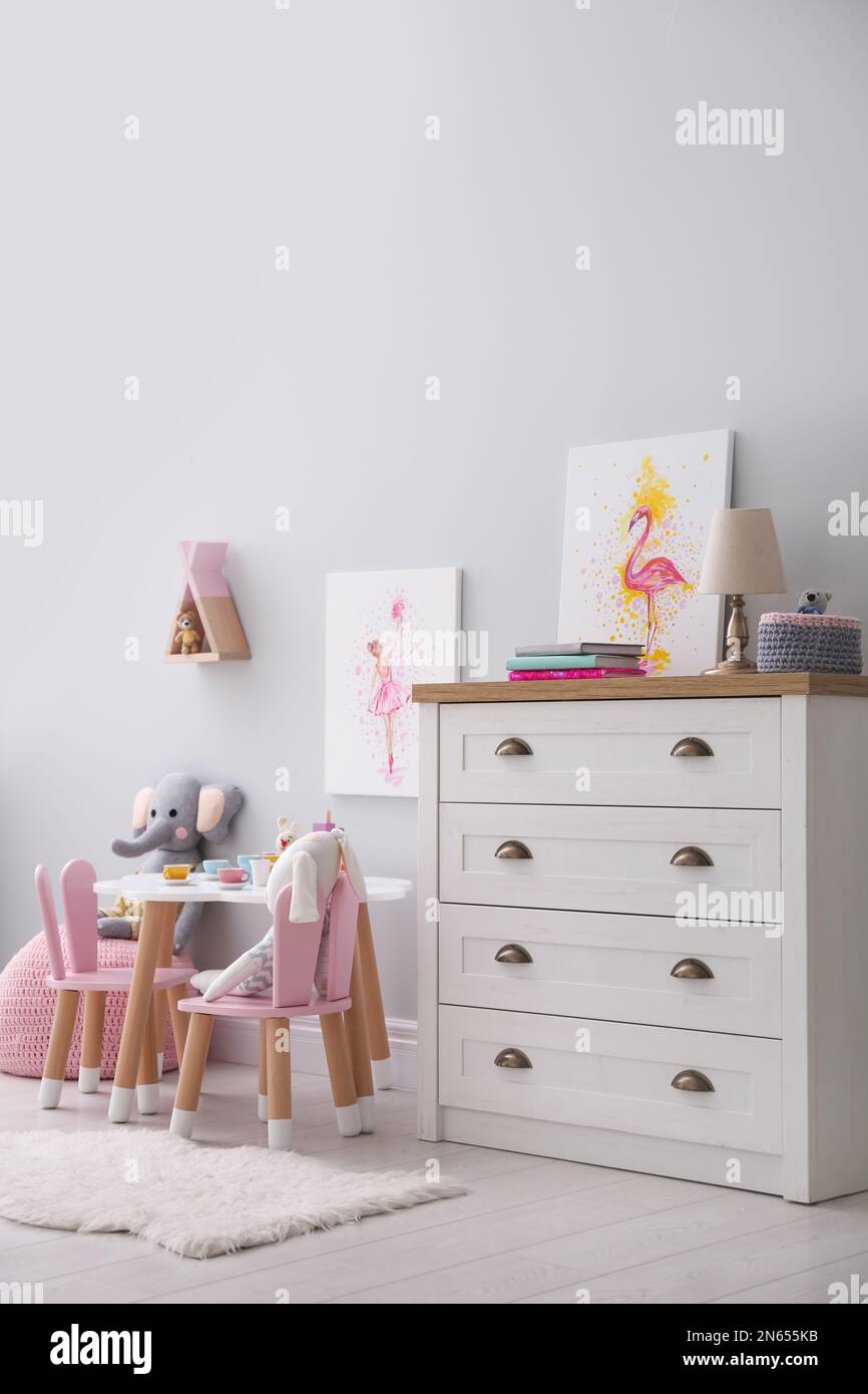 Children's room with modern furniture and pictures. Interior design ...