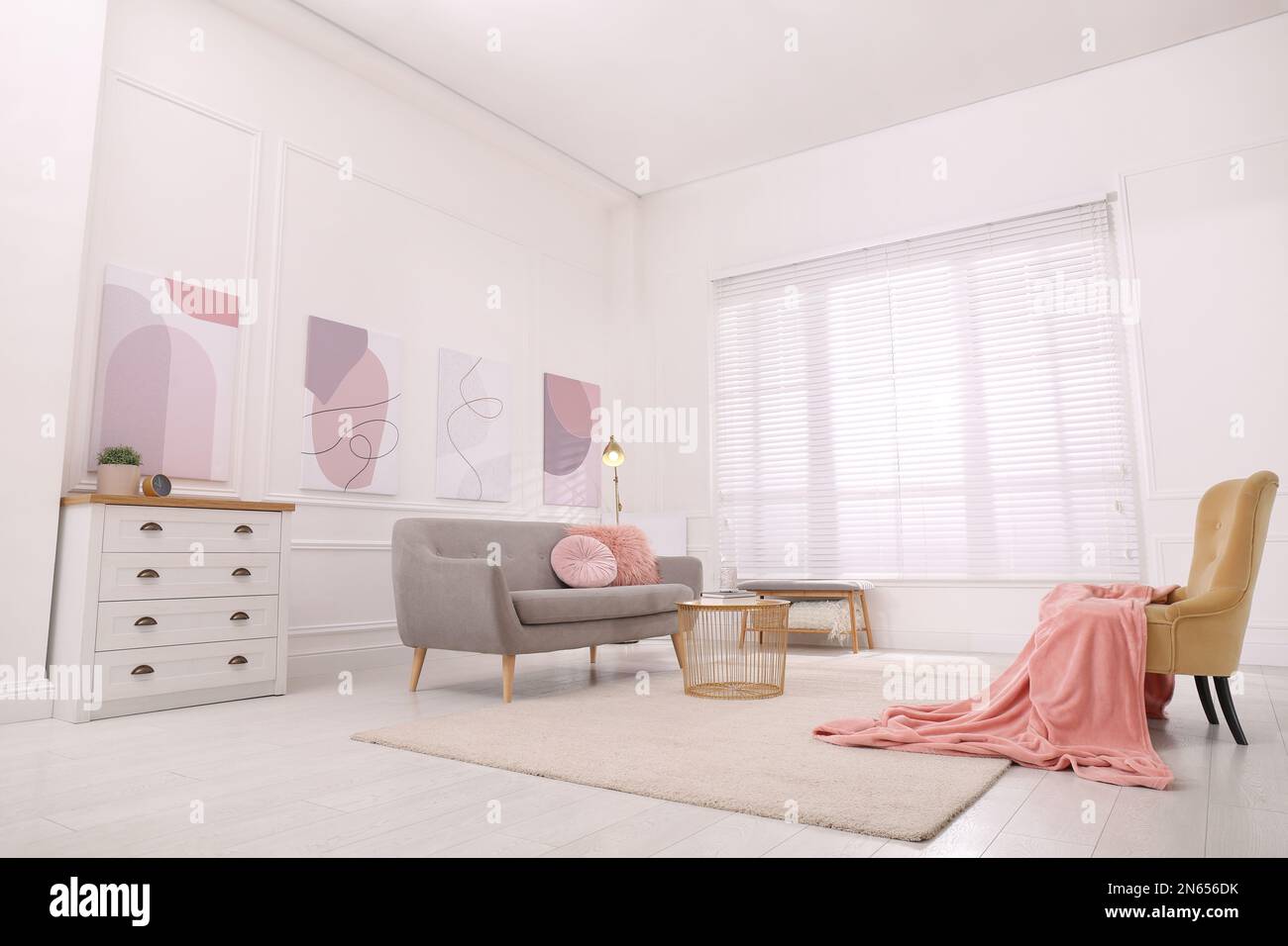 Stylish living room interior with comfortable sofa and beautiful ...