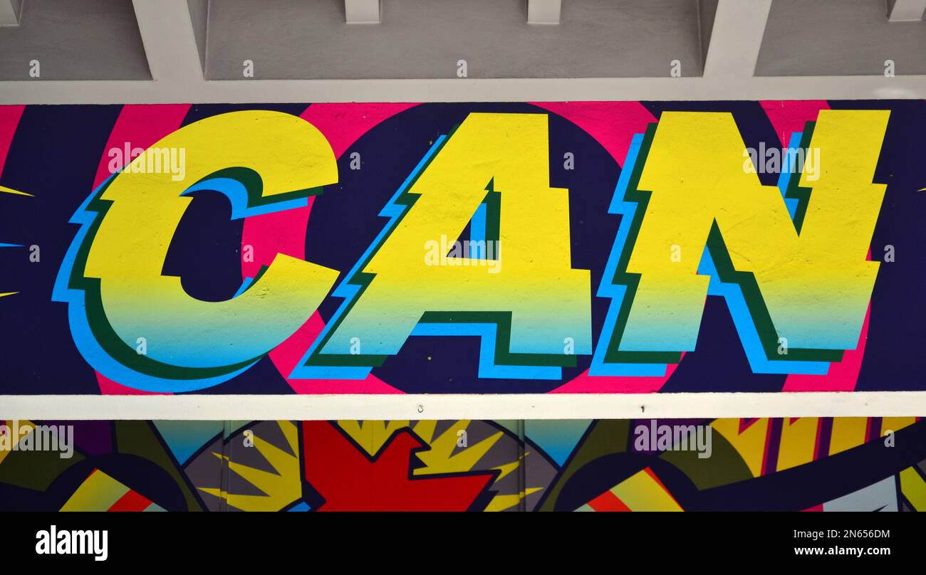 Exterior sign or notice saying: 'CAN' in capital letters and in vibrant ...