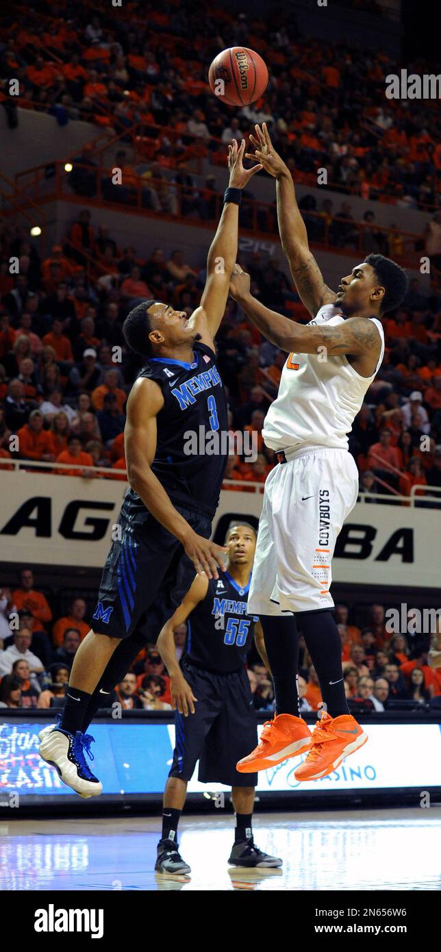 Oklahoma State wing Le'Bryan Nash, right, takes a shot over Memphis ...