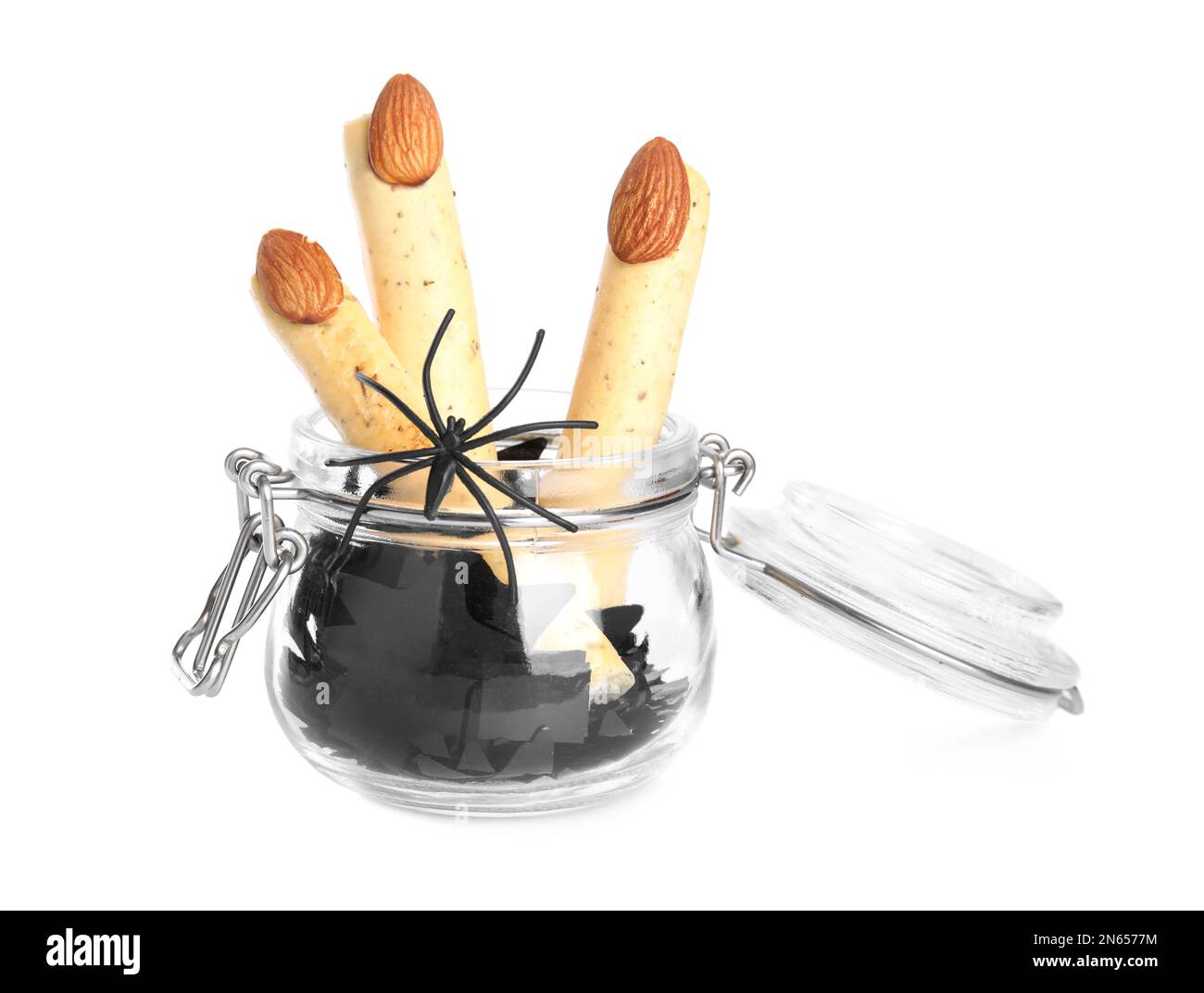 Delicious desserts decorated as monster fingers on white background ...