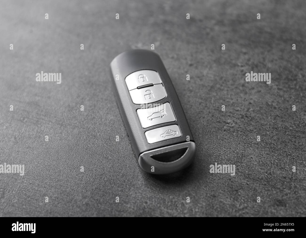 Modern car smart key on grey background Stock Photo - Alamy