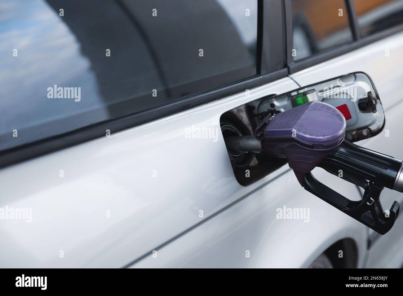Refueling modern car at gas filling station, closeup Stock Photo - Alamy