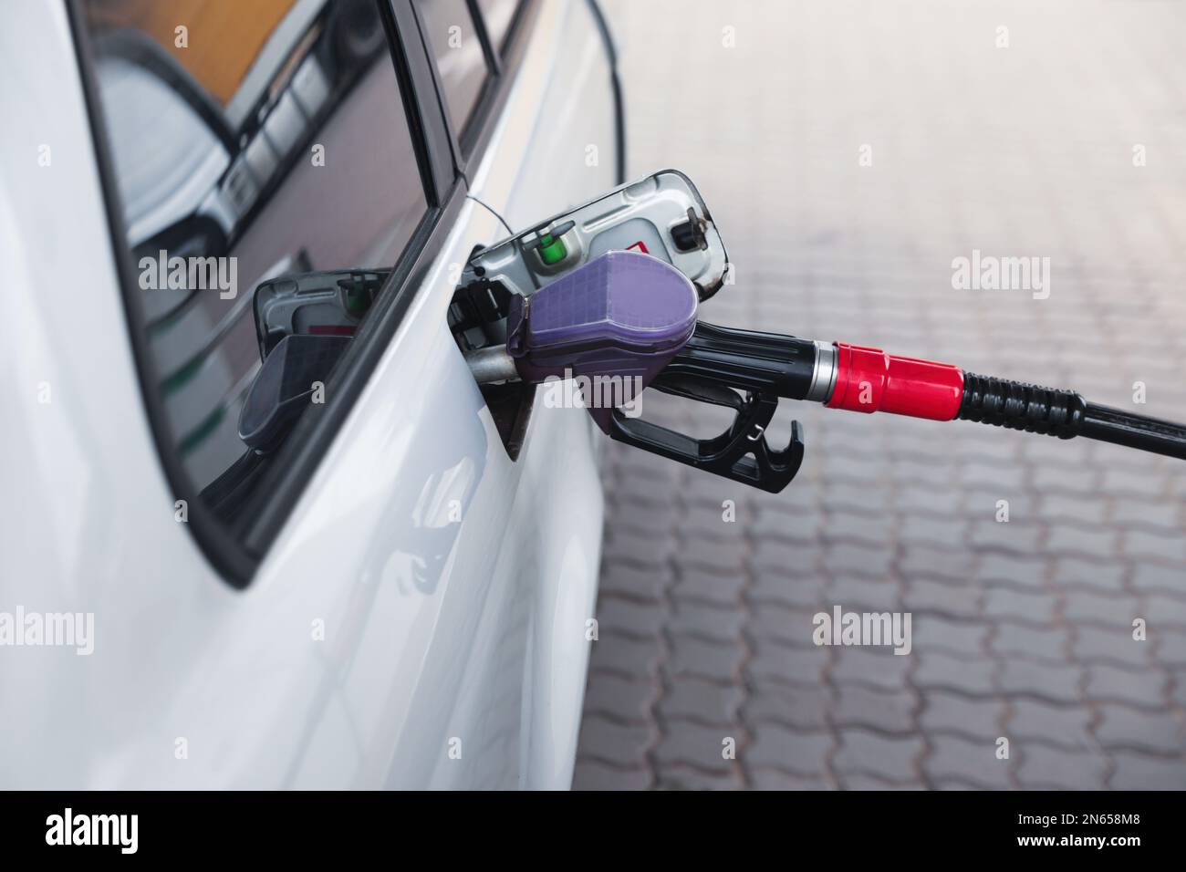 Refueling modern car at gas filling station, closeup Stock Photo - Alamy