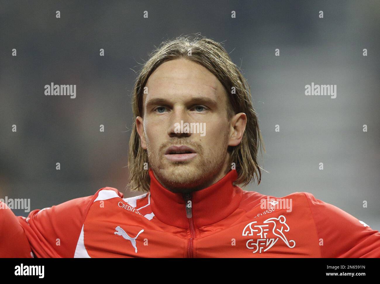 Switzerland's Michael Lang lines up before their friendly soccer match ...