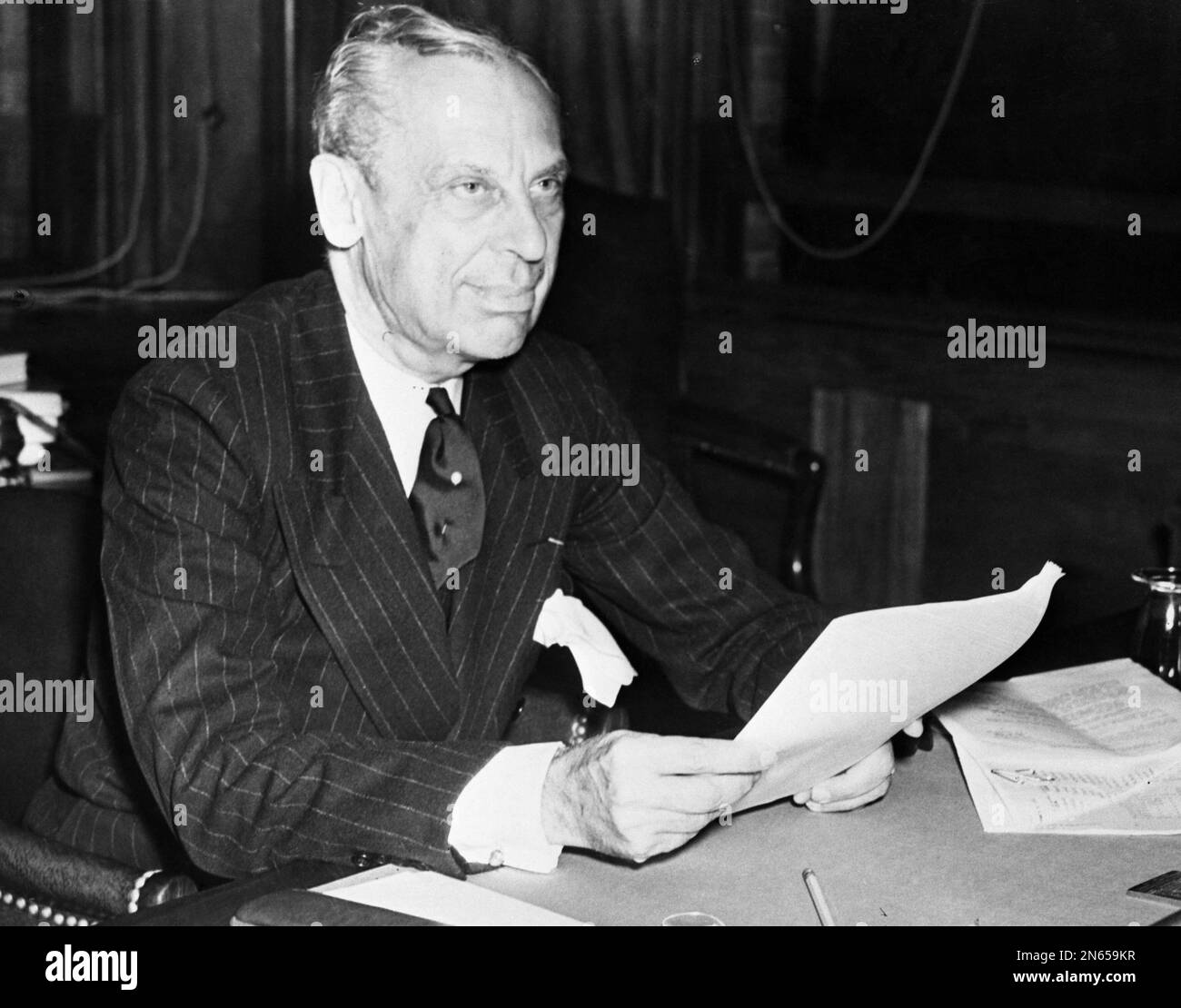 Alfred P. Sloan, Chairman of the Board of General Motors, shown around ...