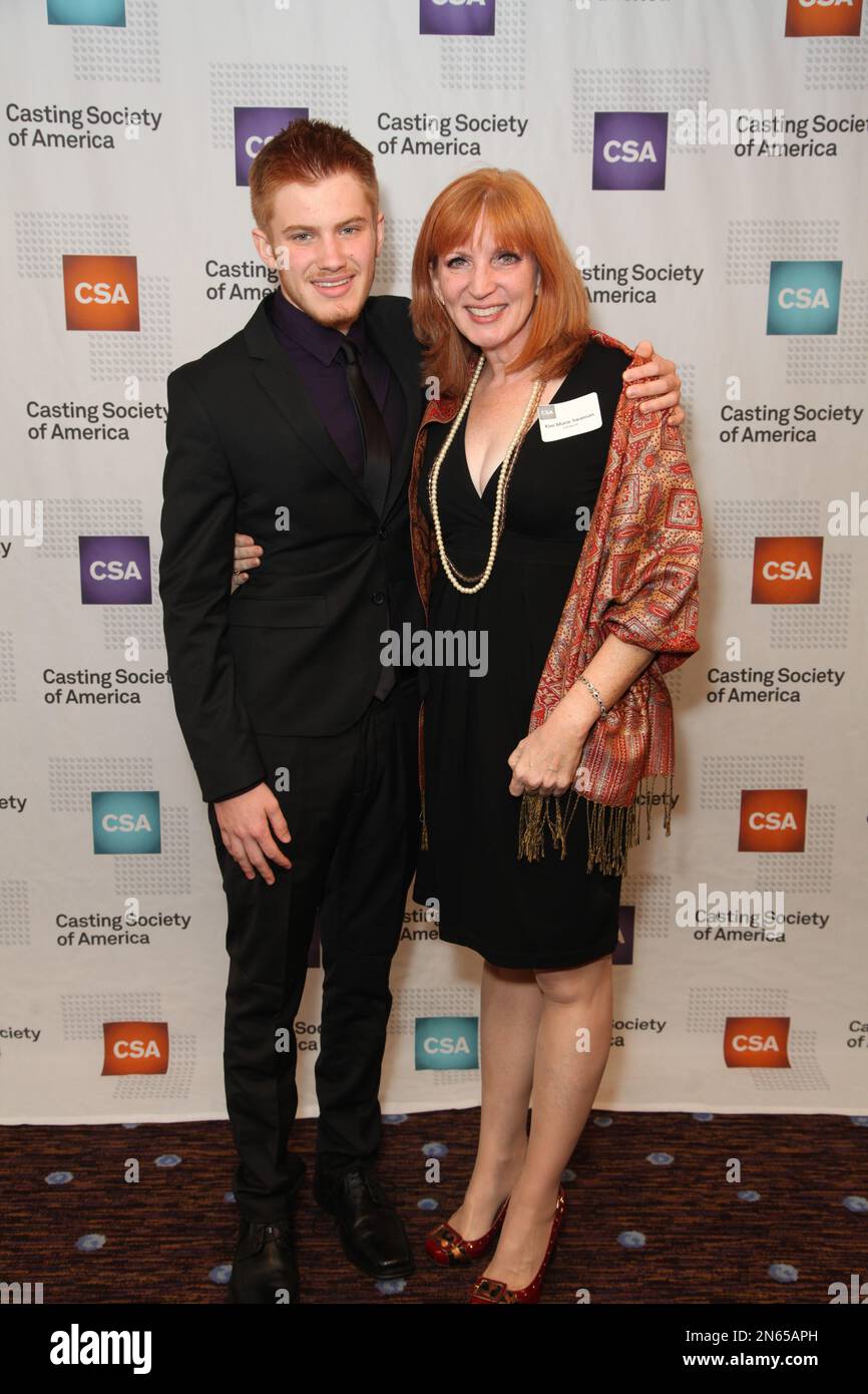 From left, William Swanson and Kim Marie Swanson pose backstage during ...