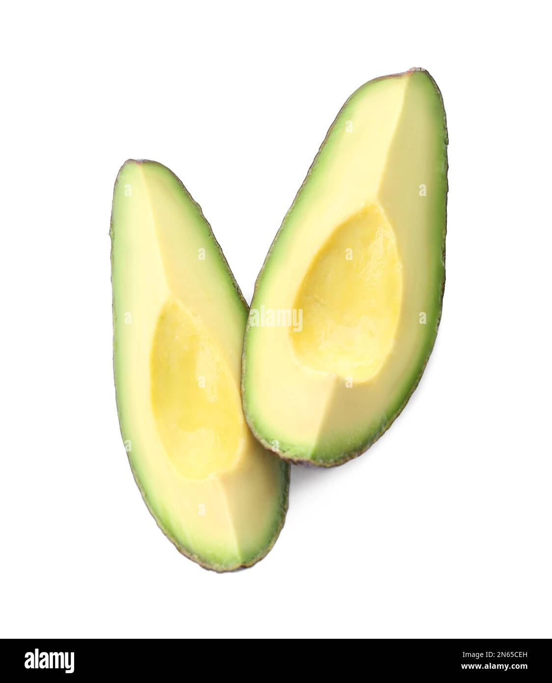 Slices of ripe avocado on white background, top view Stock Photo - Alamy