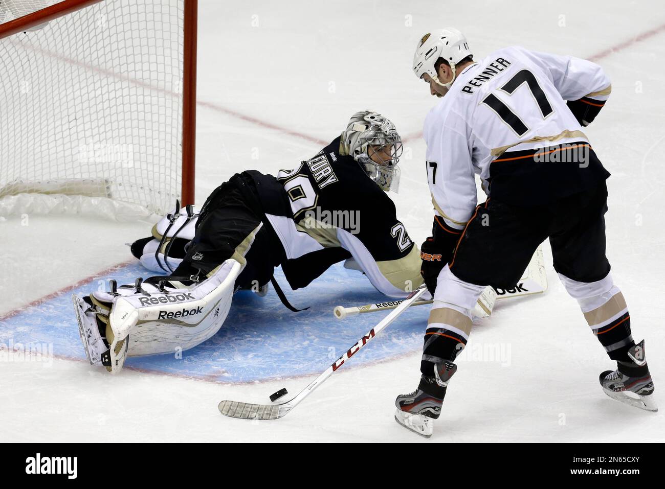Anaheim Ducks' Dustin Penner (17) can't get a shot off in front of ...