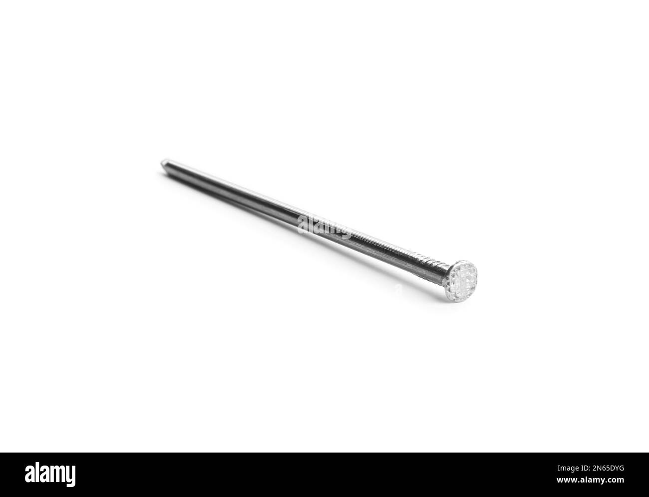 One shiny metal nail isolated on white Stock Photo - Alamy