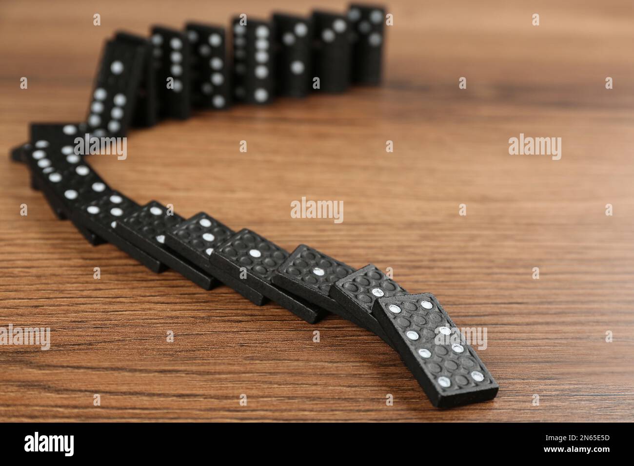 Domino effect falling chain sequence hi-res stock photography and ...