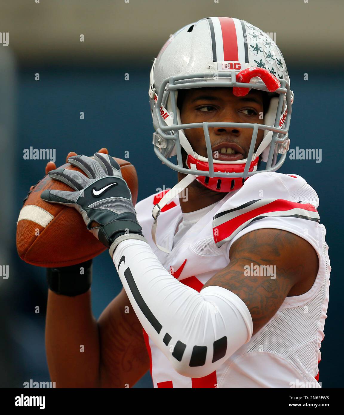 Ohio State quarterback Kenny Guiton (13) warms-up before an NCAA ...