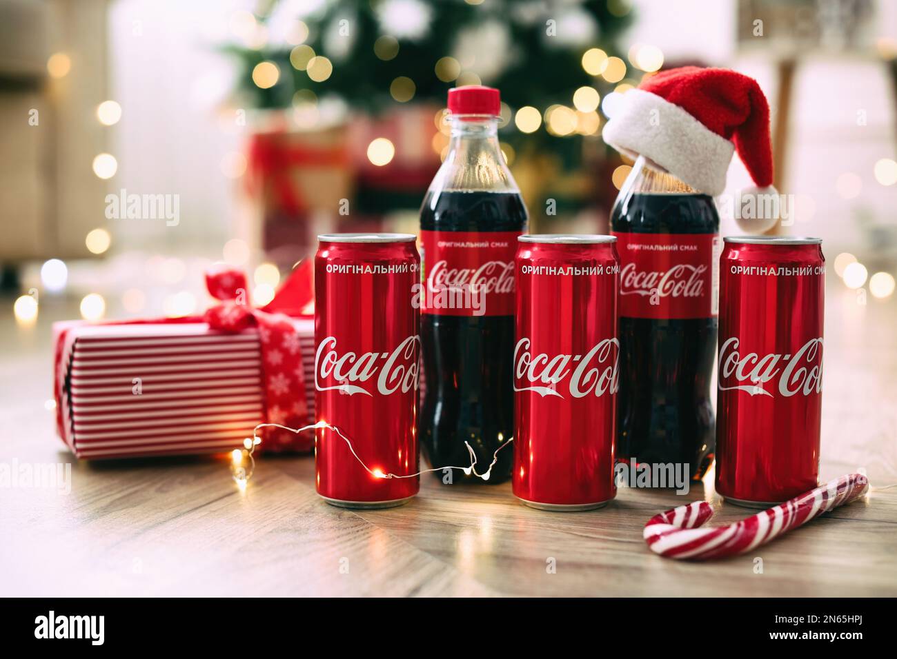 MYKOLAIV, UKRAINE - January 01, 2021: Bottles and cans of Coca-Cola on ...