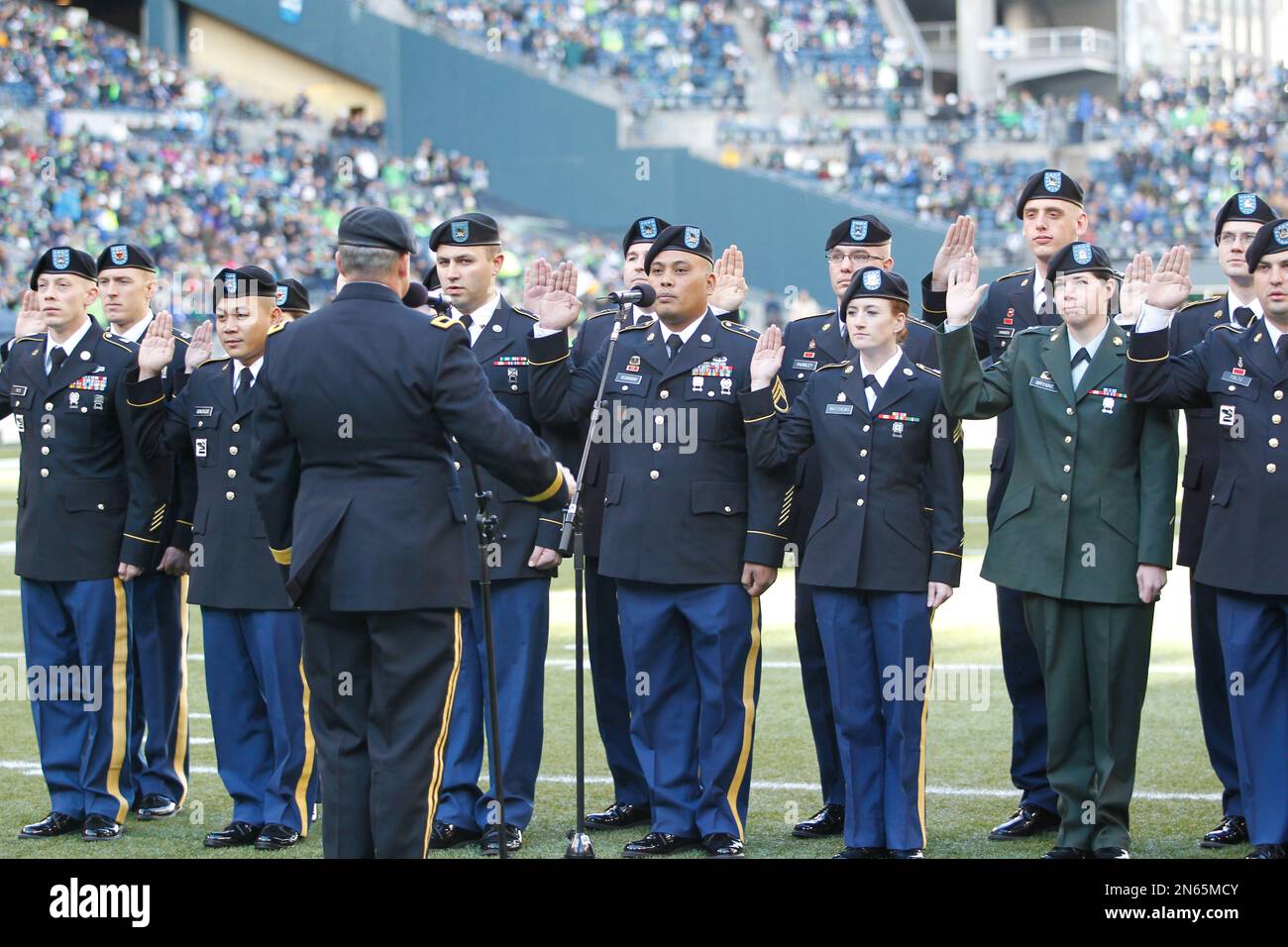 Washington National Guard members take a reenlistment oath before an ...