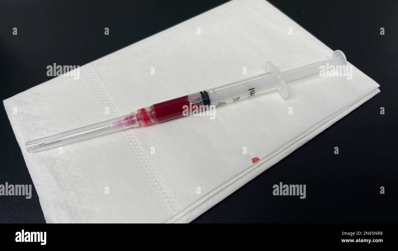 Hospital Drug Medications propofol and blood syringe Stock Photo - Alamy