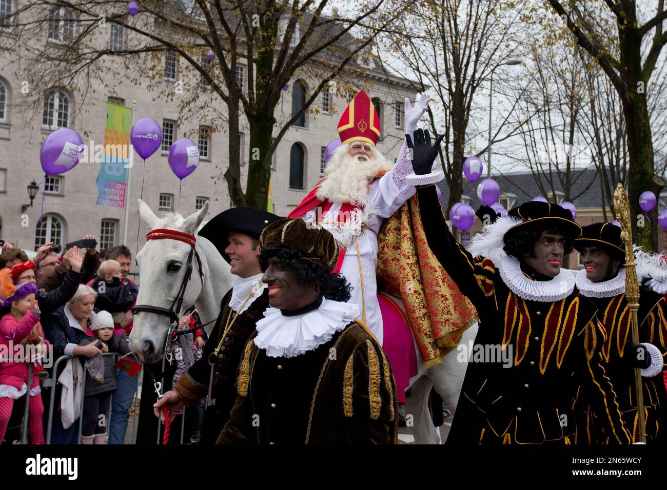 People line the road to watch the arrival of Sinterklaas, the Dutch ...