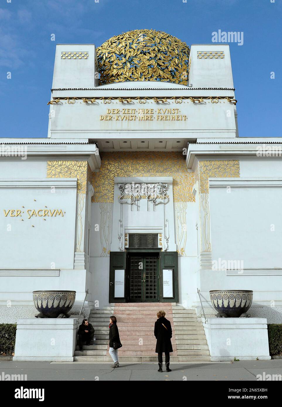 People pass the Art Nouveau building Secession that houses a gallery ...