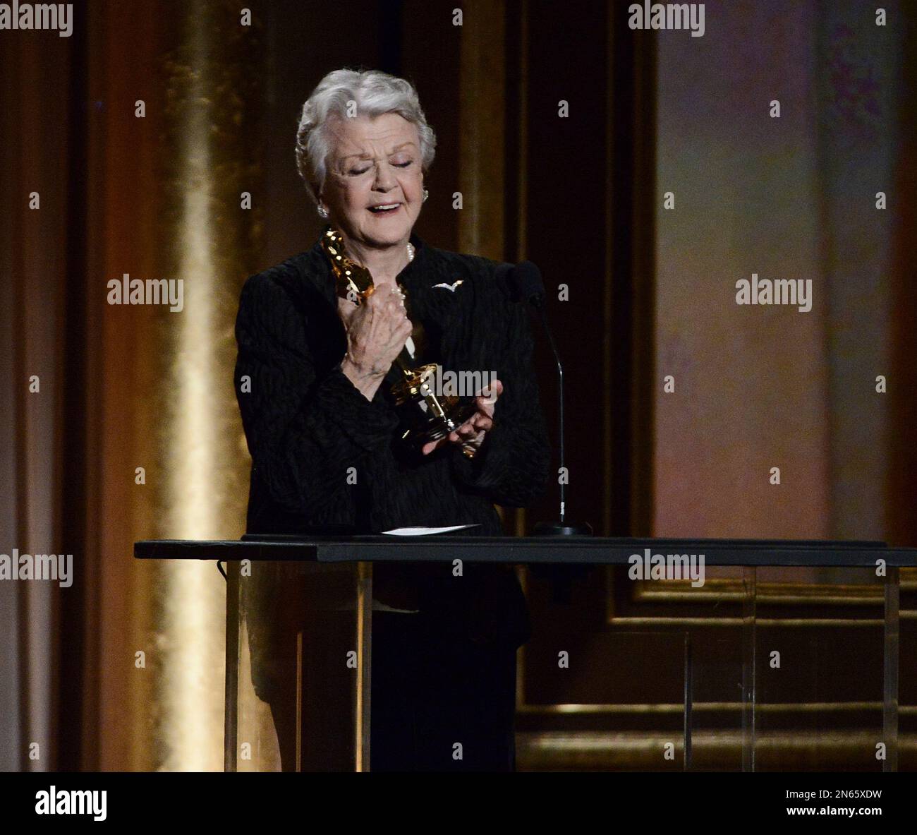 Actress and honoree Angela Lansbury accepts her award at the 2013 ...