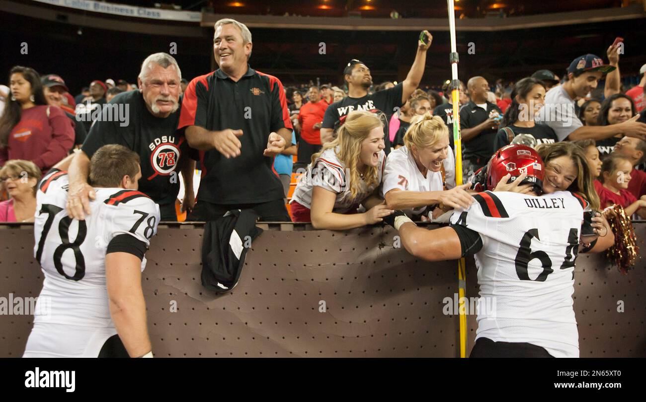 San Diego State offensive linesman Bryce Quigley (78) and his teammate ...