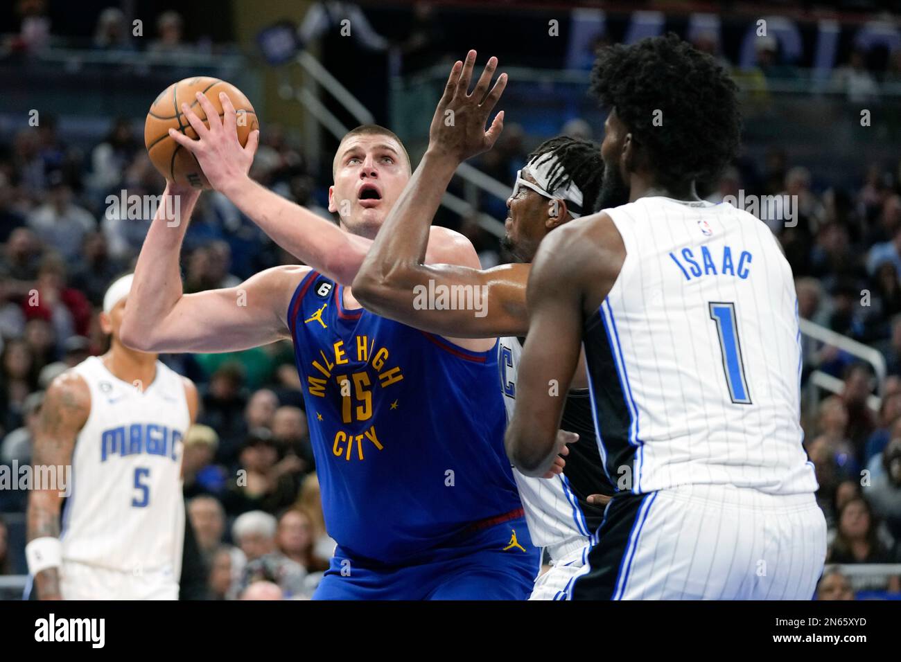 Denver Nuggets center Nikola Jokic (15) looks for a shot against ...