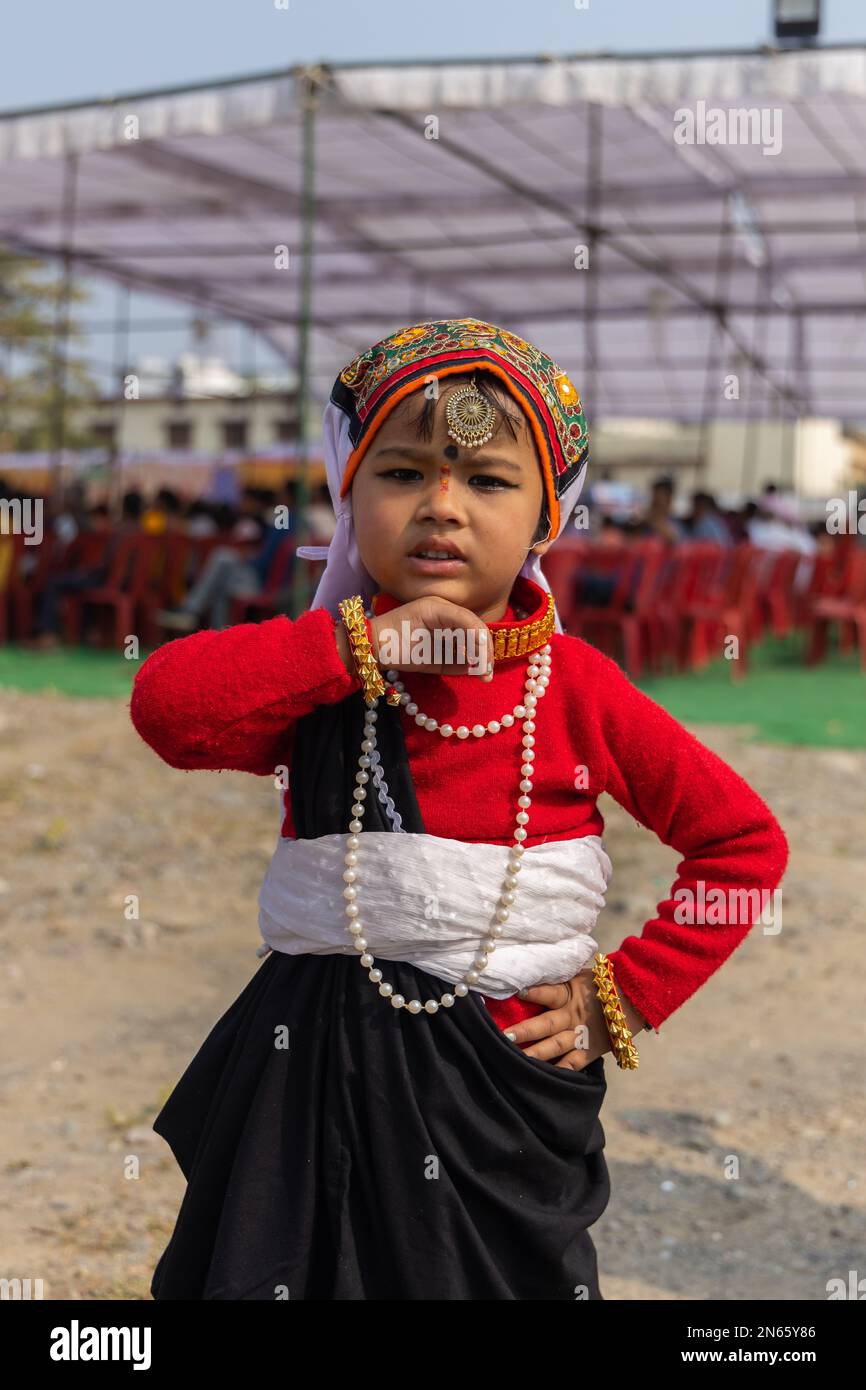 Portrait of a tribal child from the state of Uttarakhand India wearing ...