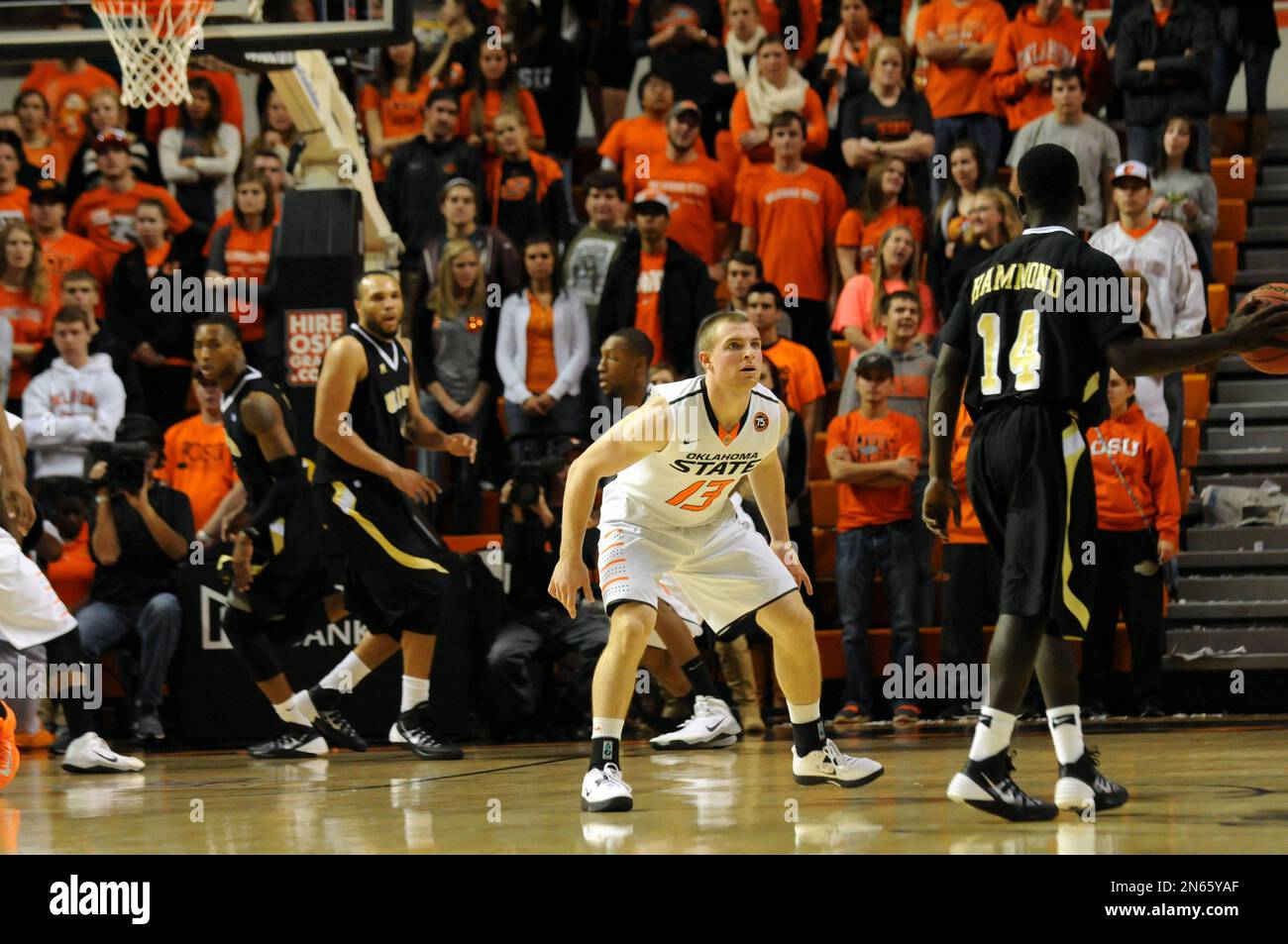 Oklahoma State guard Phil Forte watches Arkansas-Pine guard Bluff Tevin ...