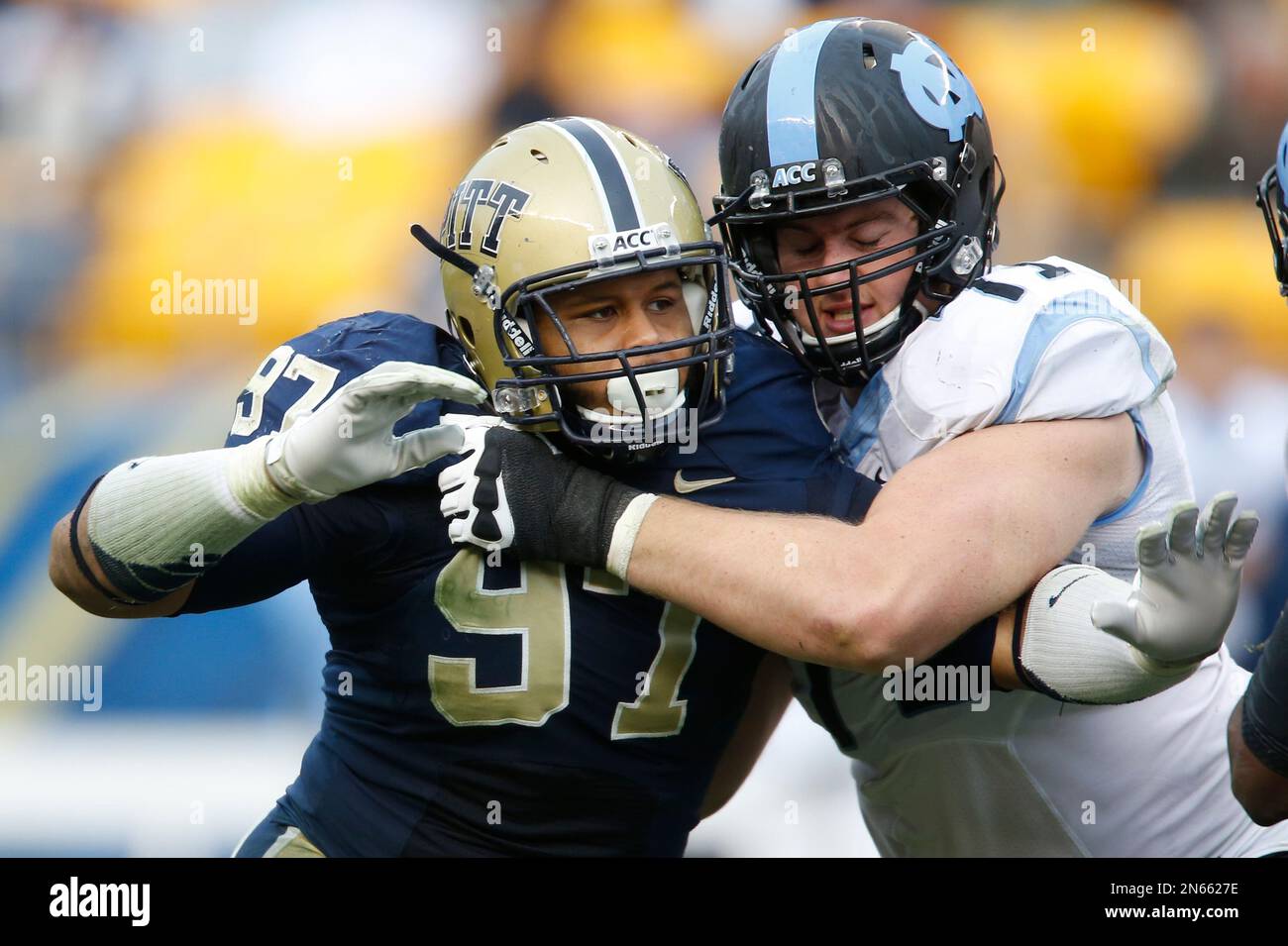 Pittsburgh defensive lineman Aaron Donald (97) in action in an NCAA ...