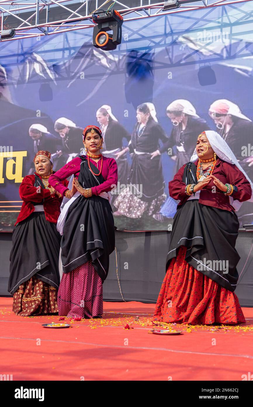 Tribal women of Uttarakhand wearing traditional attire dancing in their ...