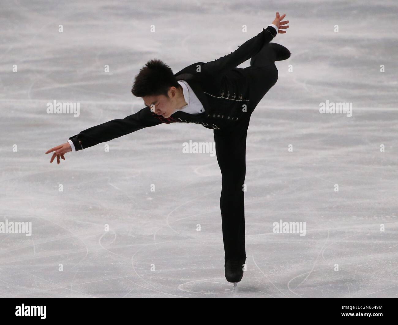 Han Yan of China, performs in the man free skating event at the ISU ...