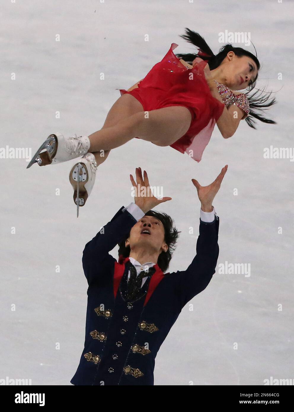Qing Pang, above, and Jian Tong of China, perform in the pairs free ...