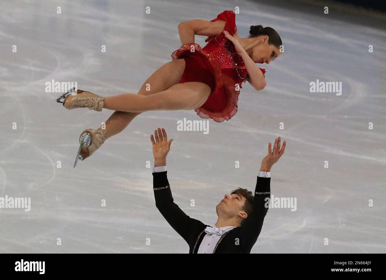 Nicole Della Monica, left, and Matteo Guarise, right, of Italy, perform ...