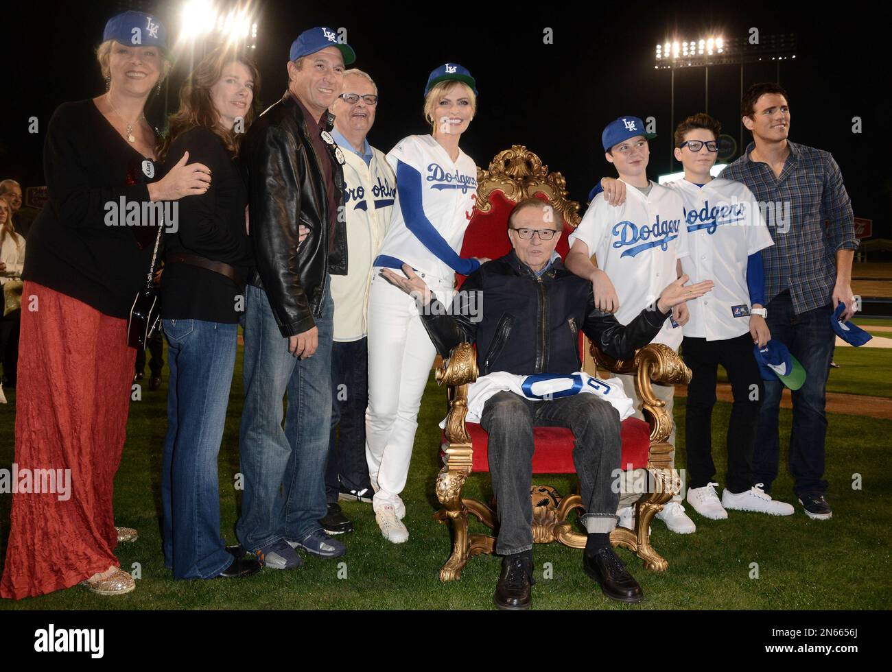 Television personality Larry King poses with his family at a surprise ...