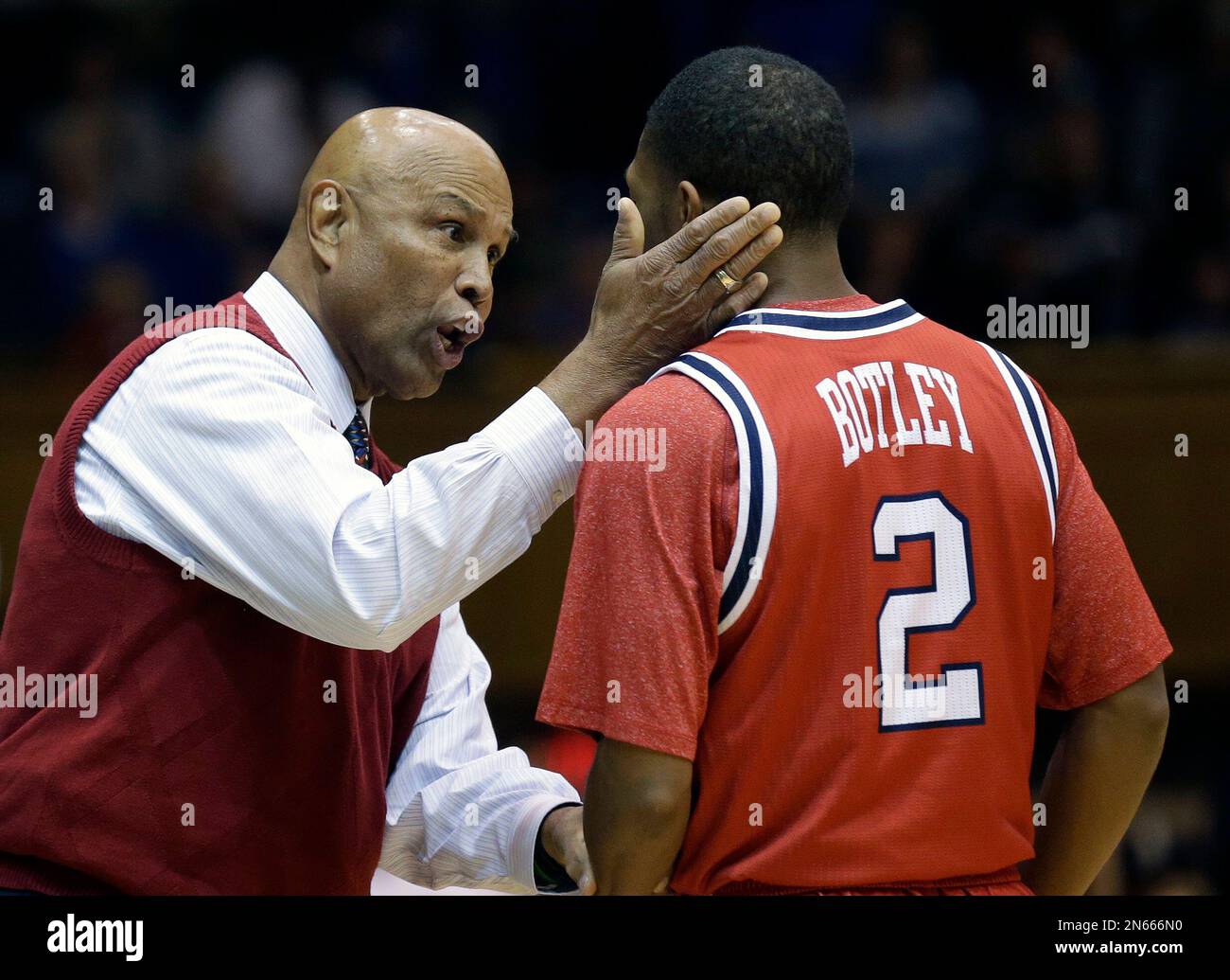 Florida Atlantic coach Mike Jarvis speaks with Marquan Botley (2 ...