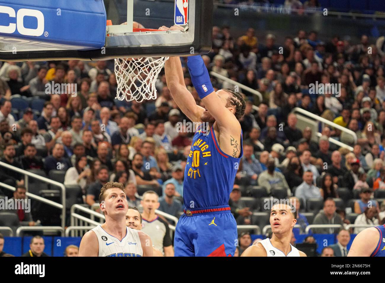 Orlando, Florida, USA, February 9, 2023, Denver Nuggets forward Aaron Gordon #50 makes a dunk in ...