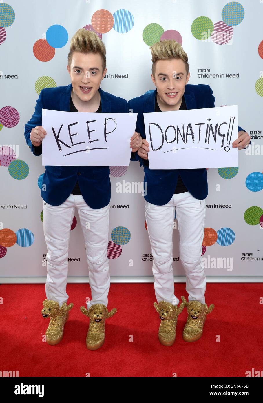 John and Edward Grimes, AKA Jedward, pose backstage at the BBC Children ...