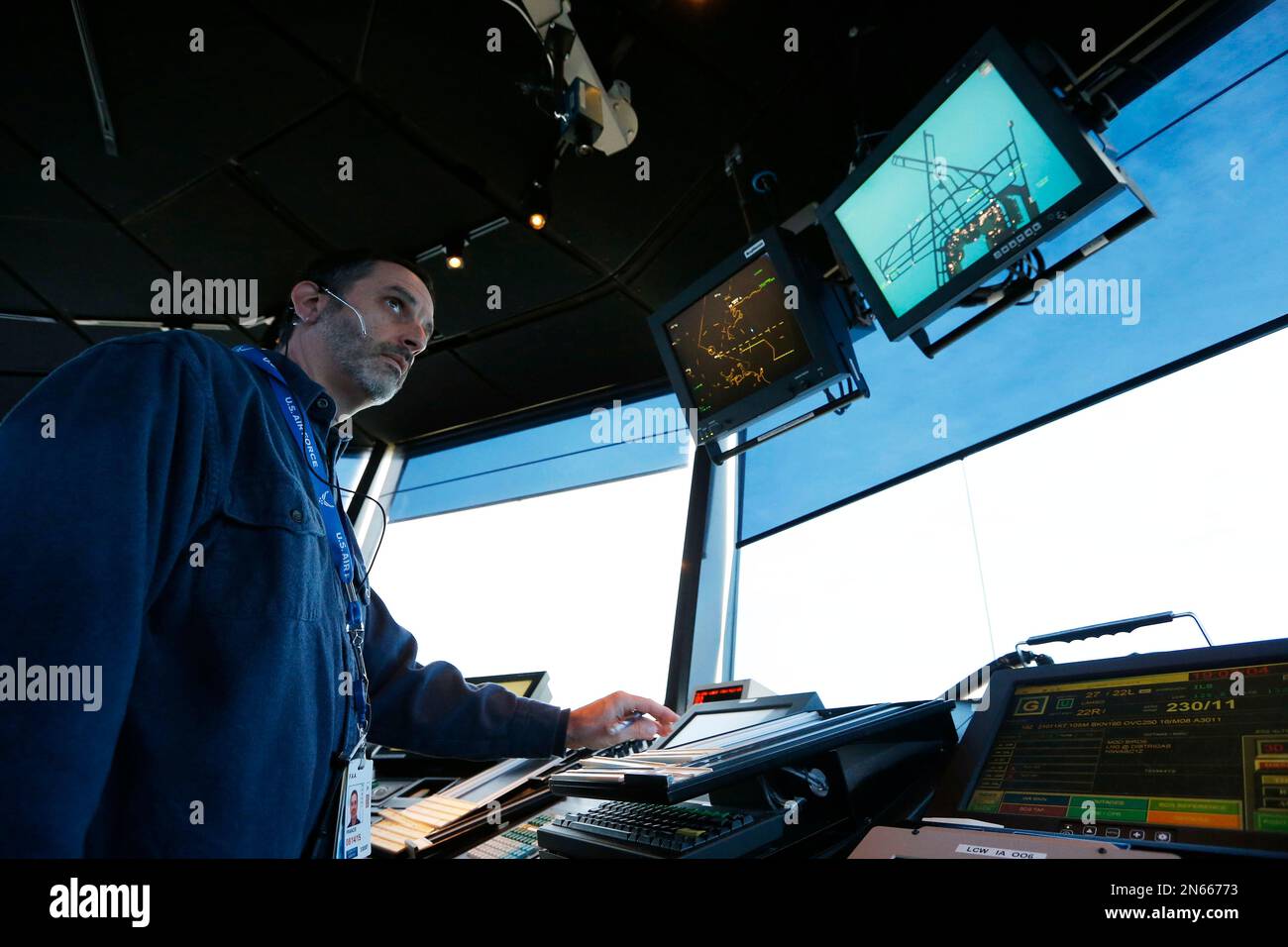 Air traffic controller Bob Francis works in the tower at Logan ...