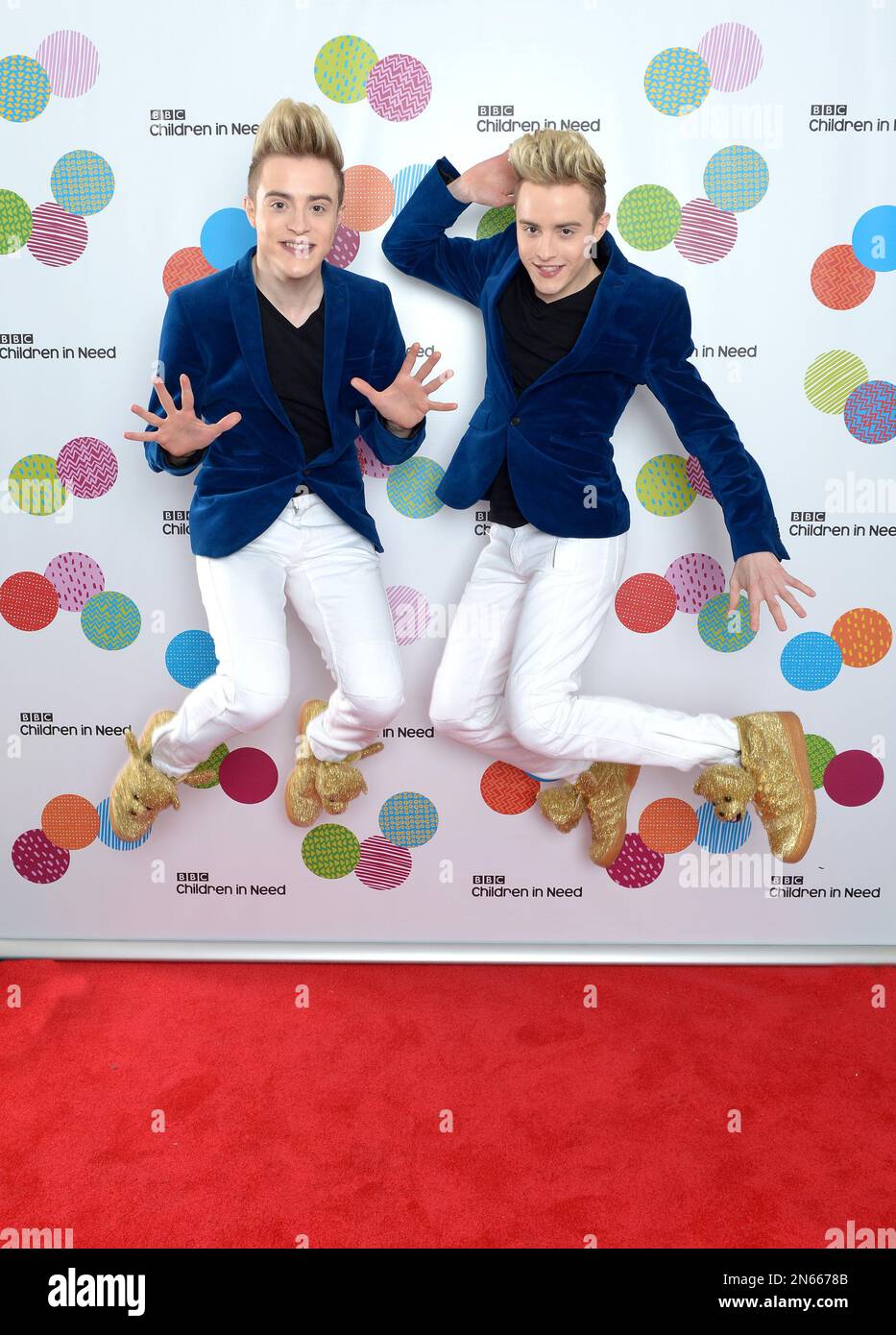 John and Edward Grimes, AKA Jedward, pose backstage at the BBC Children ...