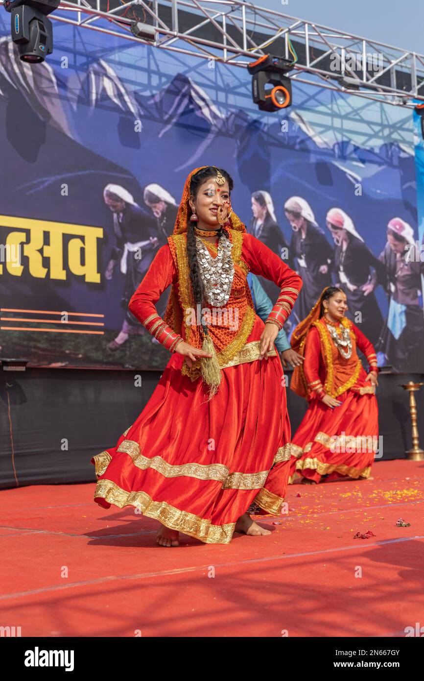 Tribal women of Uttarakhand wearing traditional attire dancing in their ...