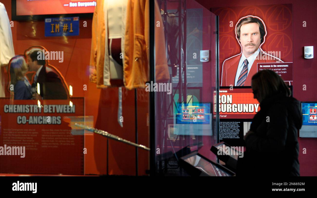 A Newseum visitor looks at the "Anchorman" movie exhibit at the Newseum ...