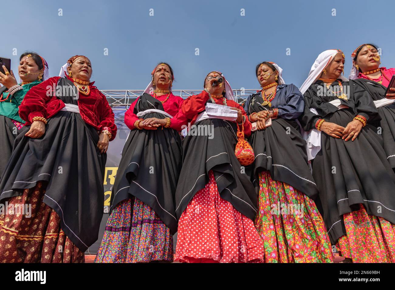 Tribal women of Uttarakhand wearing traditional attire singing folklore ...