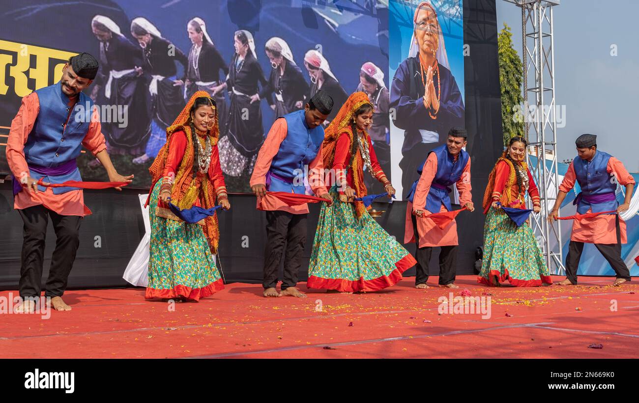 Tribal men and women wearing traditional attire dancing at the Johar ...